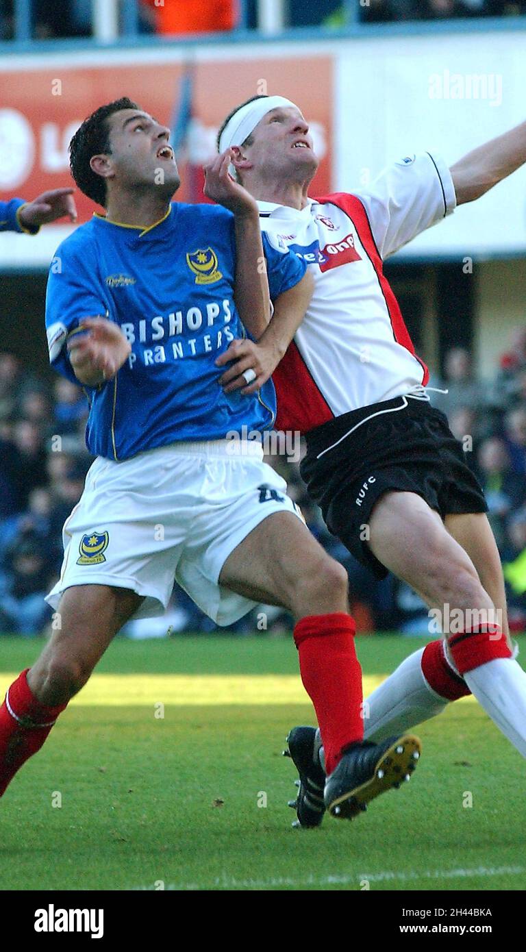 PORTSMOUTH V ROTHERHAM LEO BIAGINI IN AN AERIAL BATTLE WITH CHRIS ...