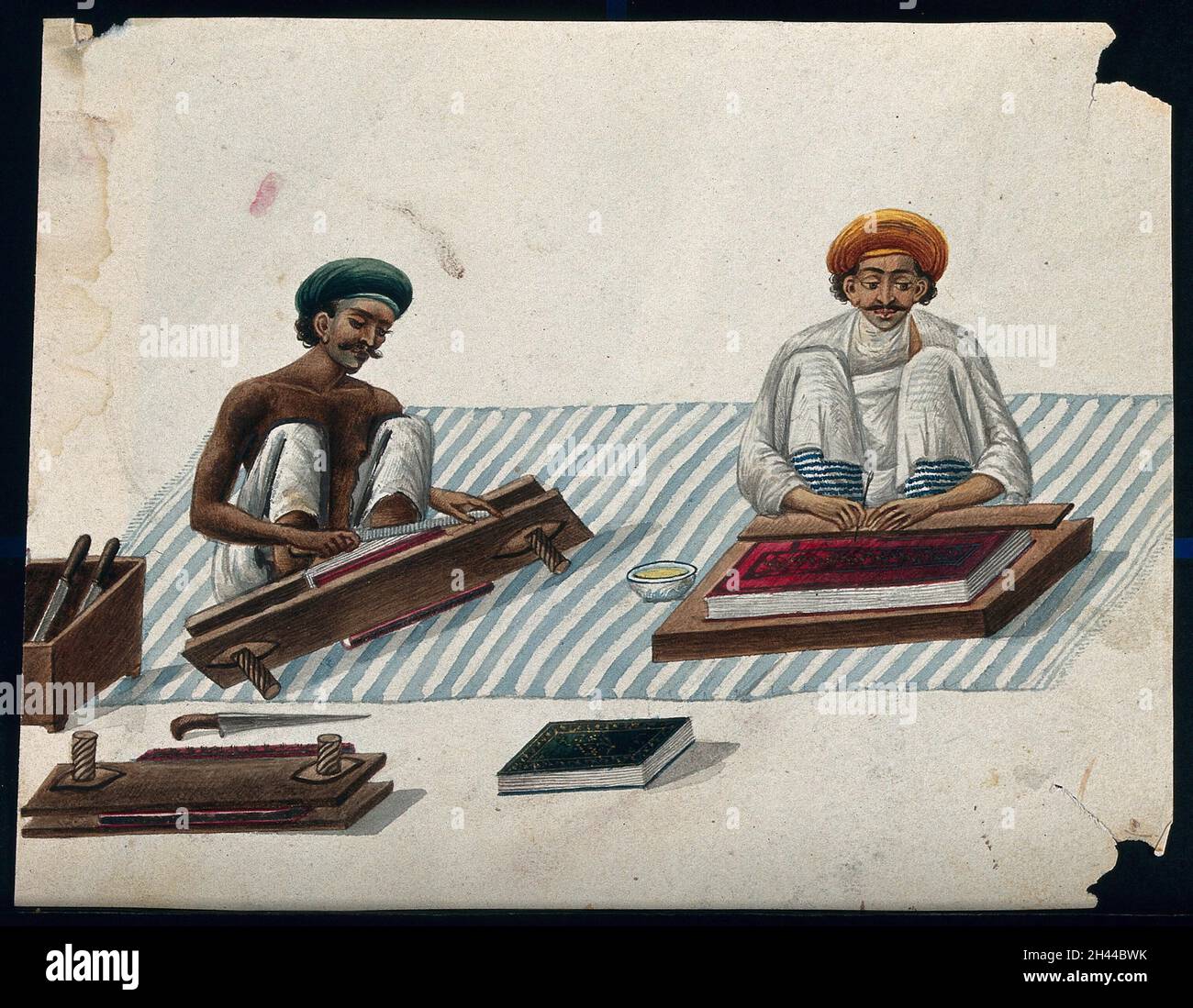 Two men binding books. Gouache painting by an Indian artist Stock Photo ...