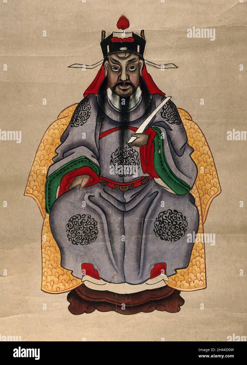 A Chinese deity with dark complexion and beard, seated on a throne ...