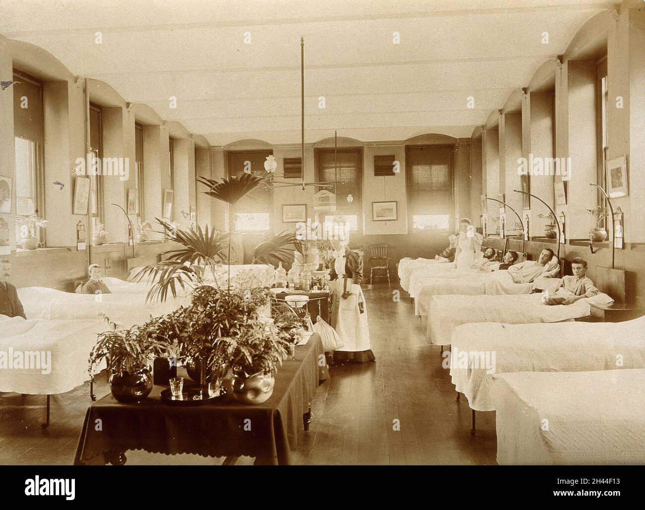 The Royal United Hospital, Bath: nurses and patients on a male ward ...