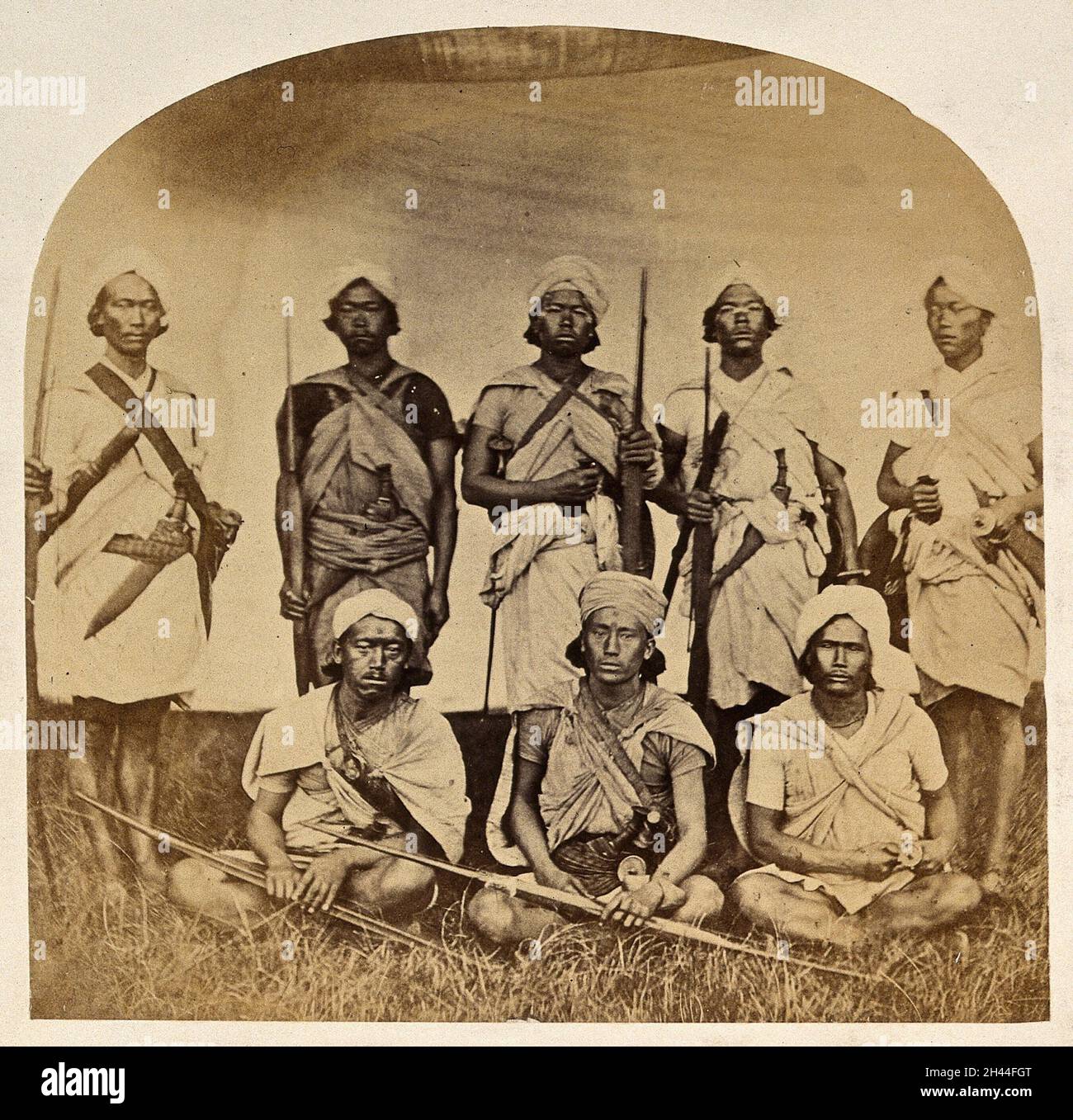 Nepal: Magar military men bearing weapons: group portrait. Photograph ...