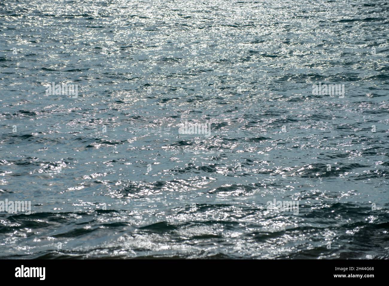 Calm sea water surface texture with splashes and waves. Abstract nature ...