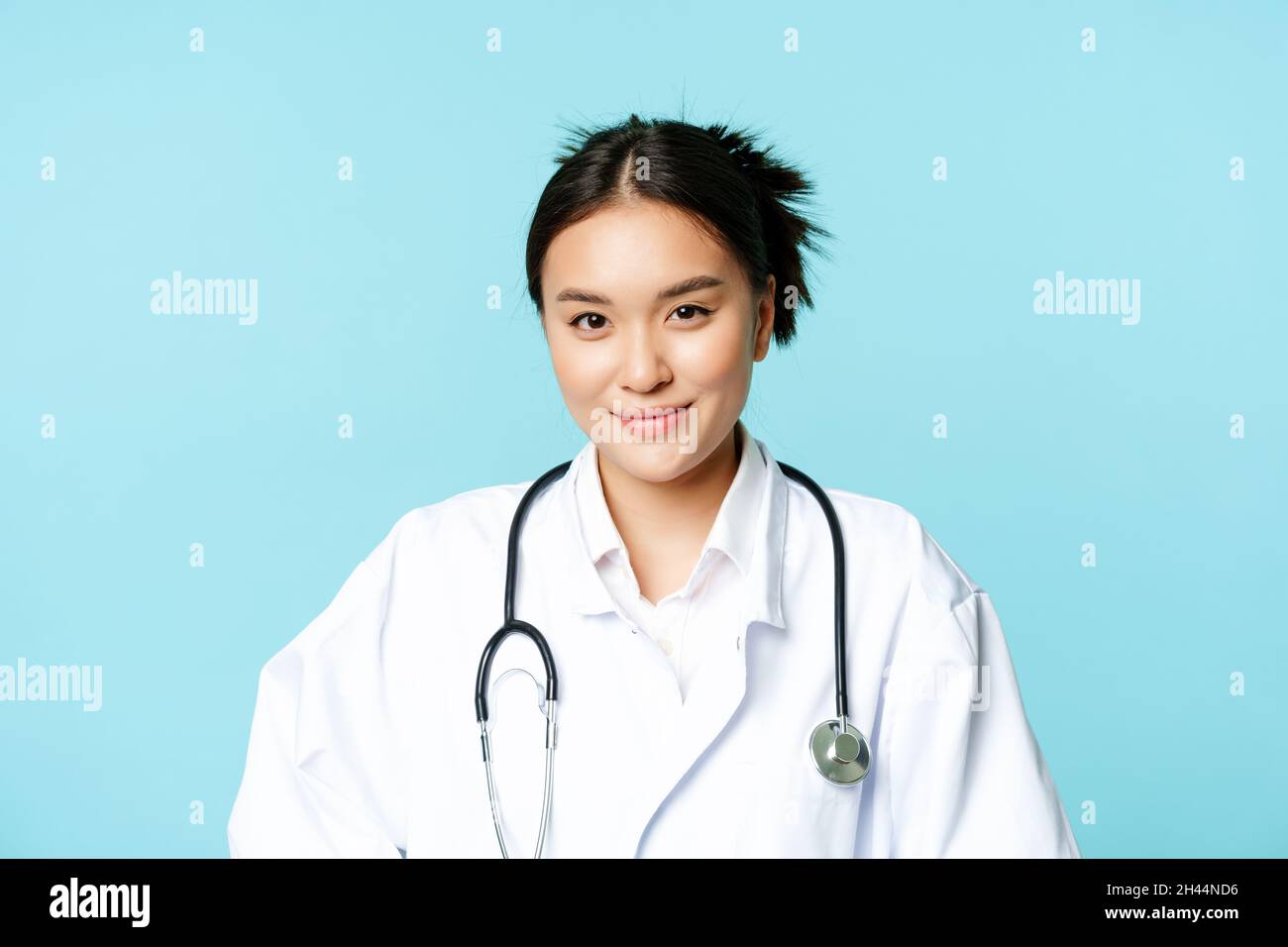 Healthcare and medical concept. Korean female doctor, nurse in uniform ...