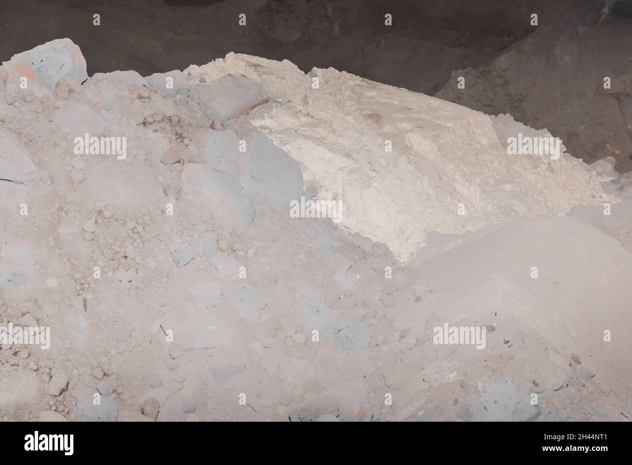 Mixture in a pile of bentonite clay and sand, processing of land and ...