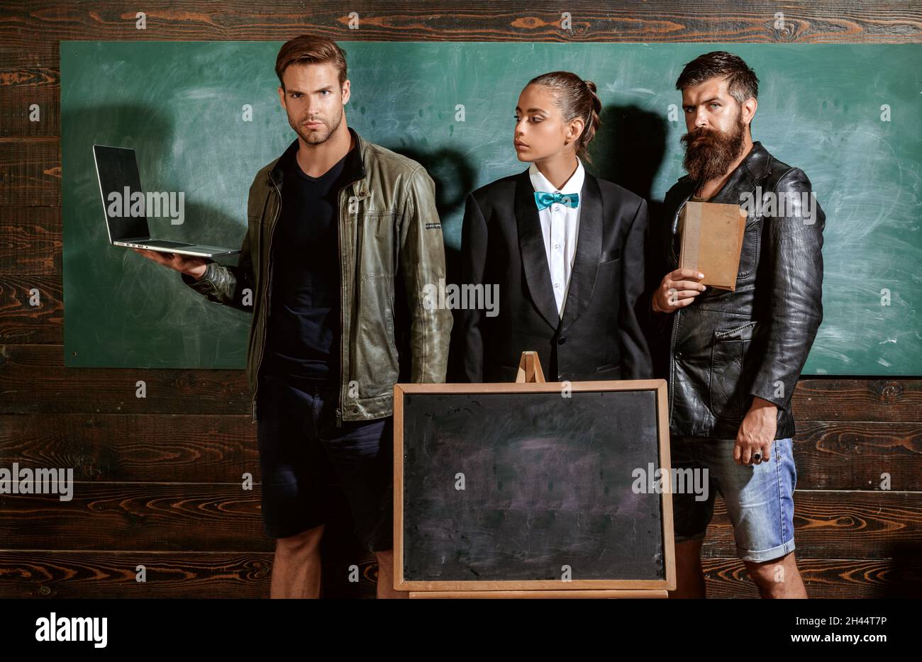 Group of different students in classroom at college, school or ...