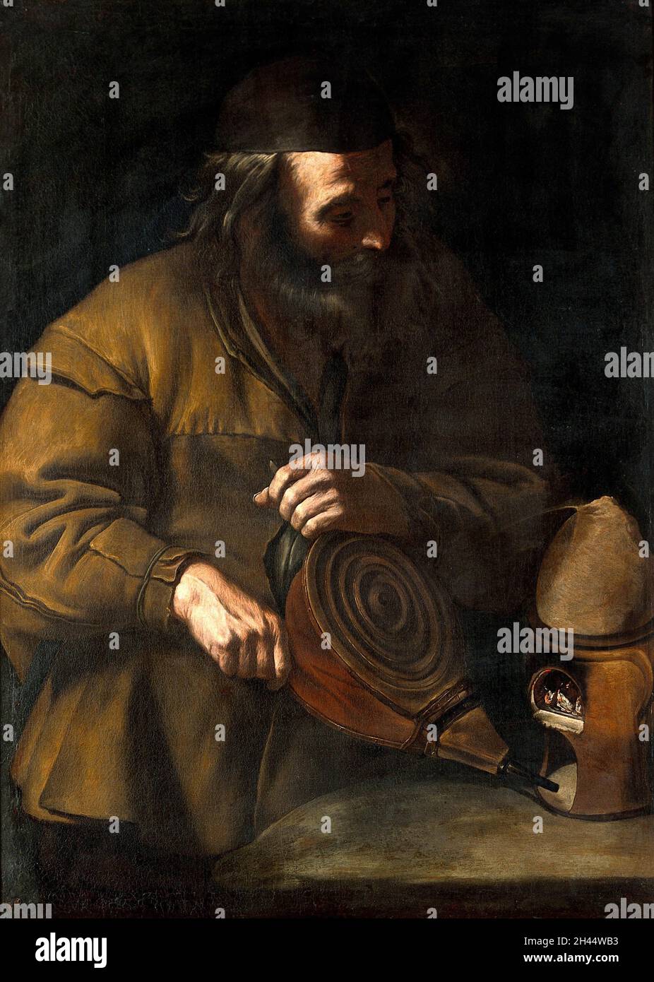 An alchemist applying bellows to a fire beneath a retort. Oil painting ...