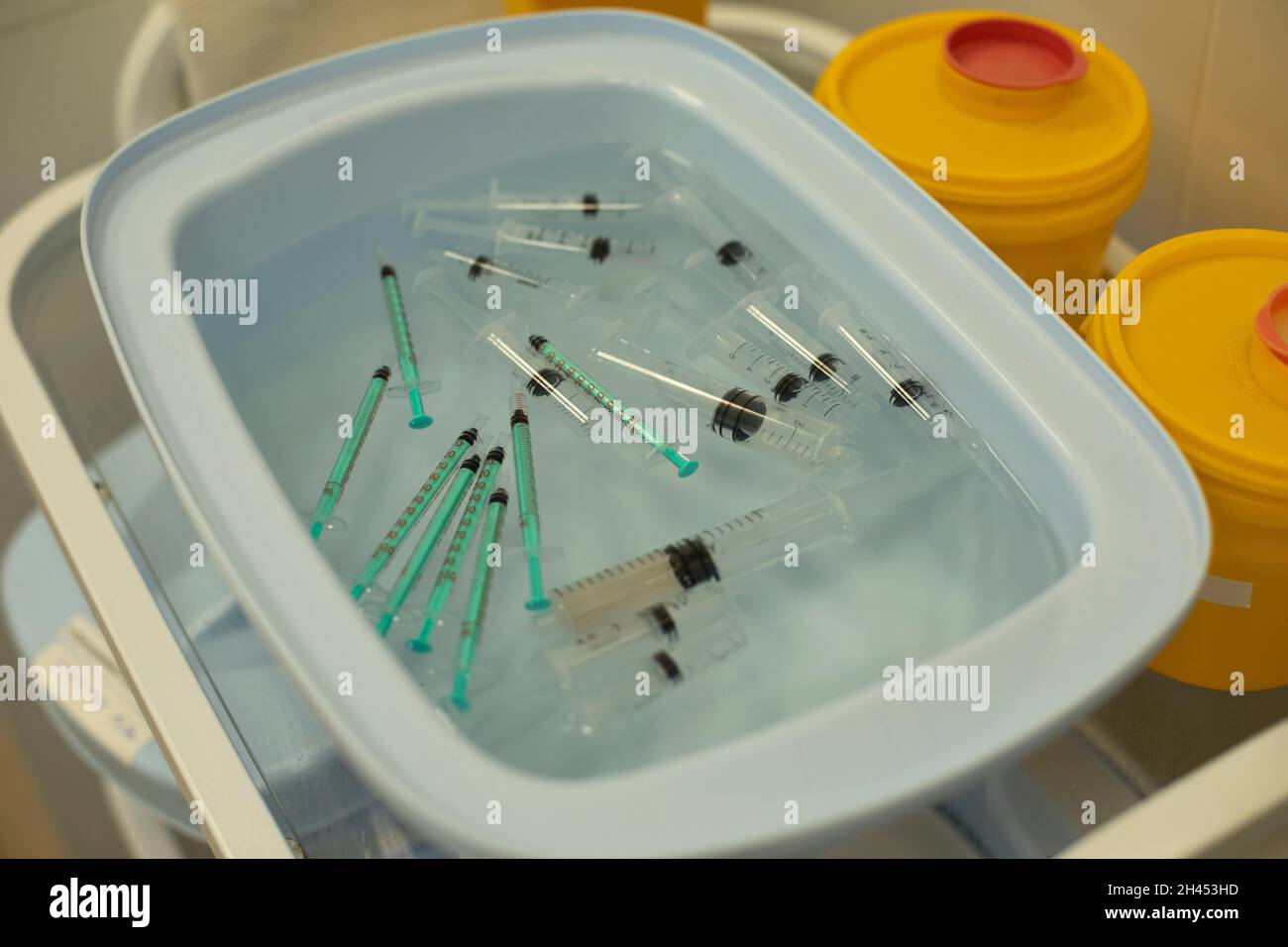 Syringes are in the water. Instrument in the medical office. The ...