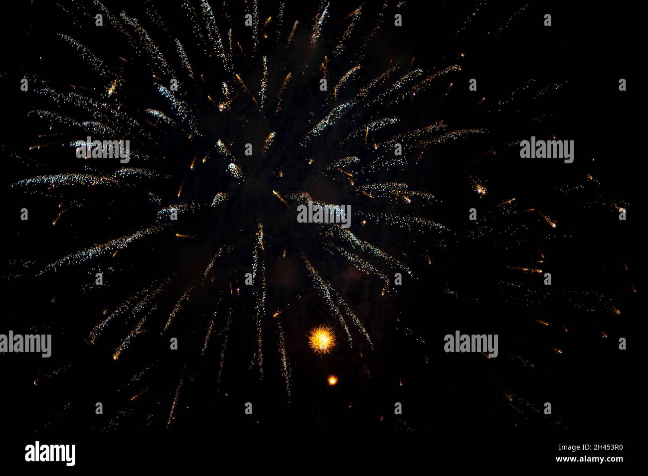 Salute in the sky. Explosion of fireworks in the night sky ...