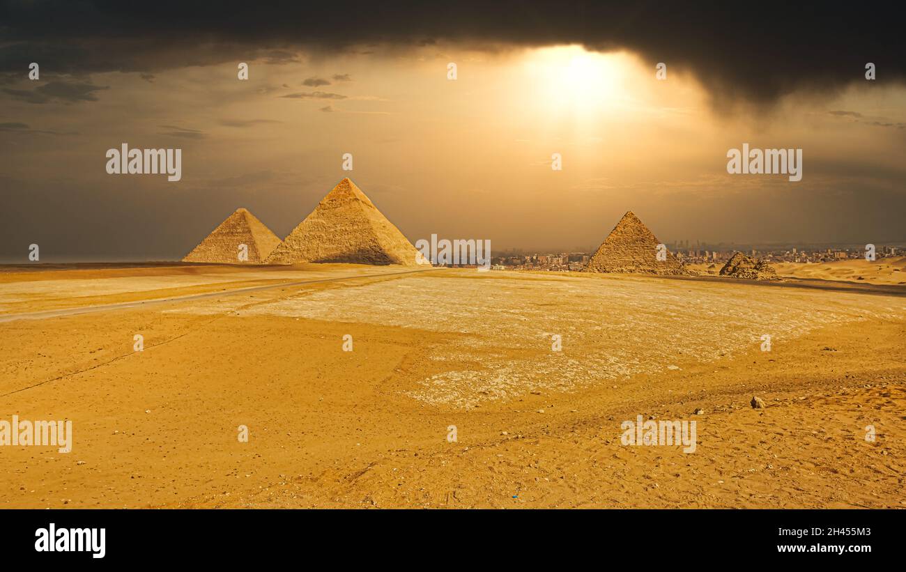 The Famous Pyramids At Giza In Egypt With A Dramatic Sky Stock Photo ...