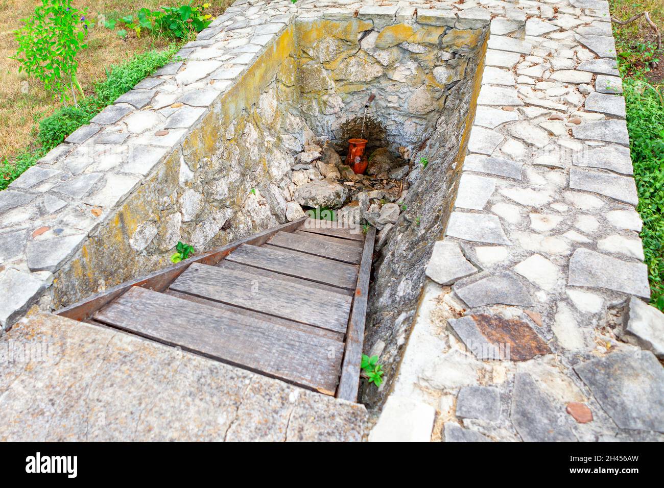 Stairs to underground fresh water . Natural source of drinking water ...