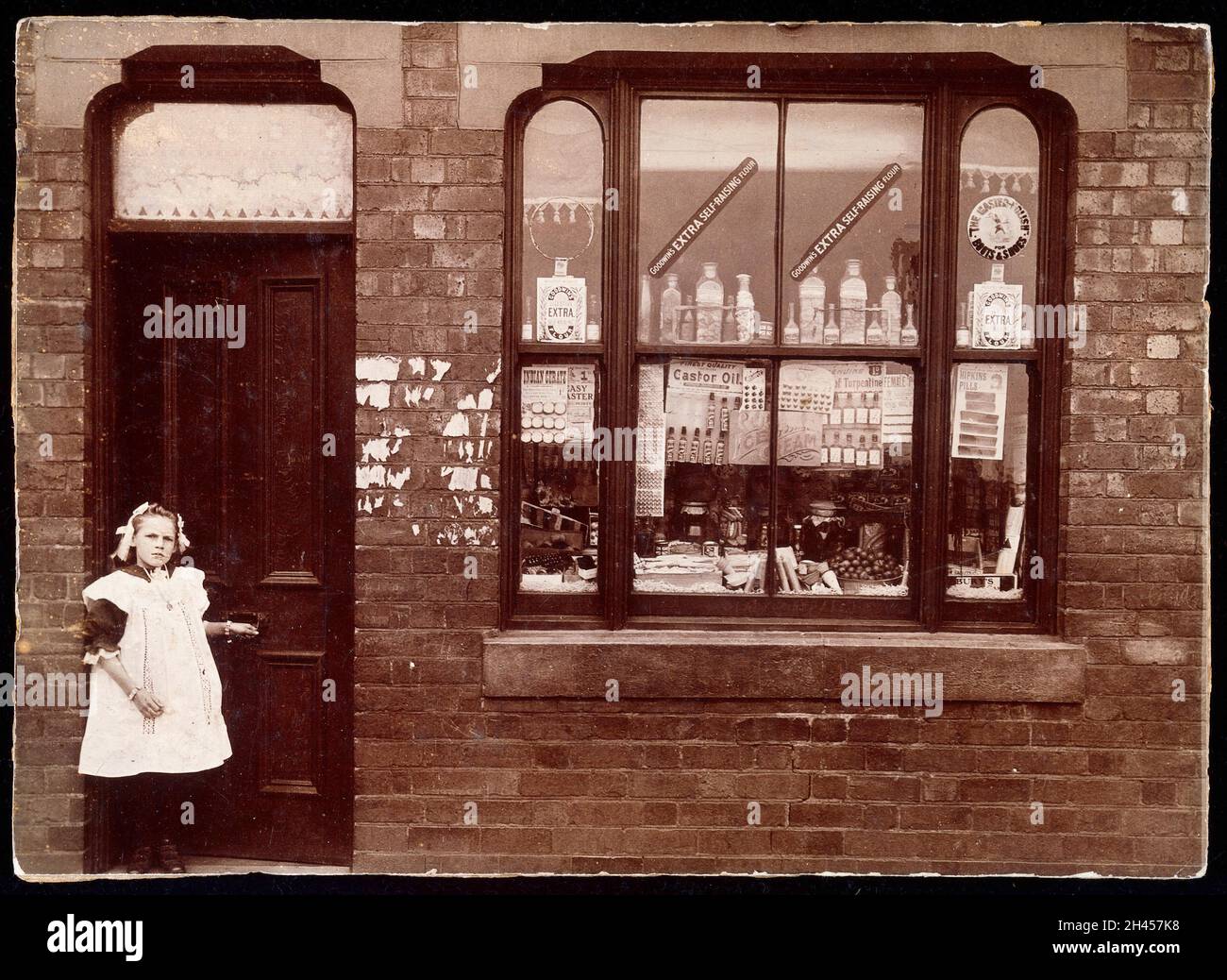 A grocer's shop in England: doorway and shop window. Photograph Stock ...