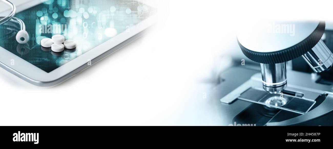 microscope in lab and stethoscope with computer tablet for tele ...