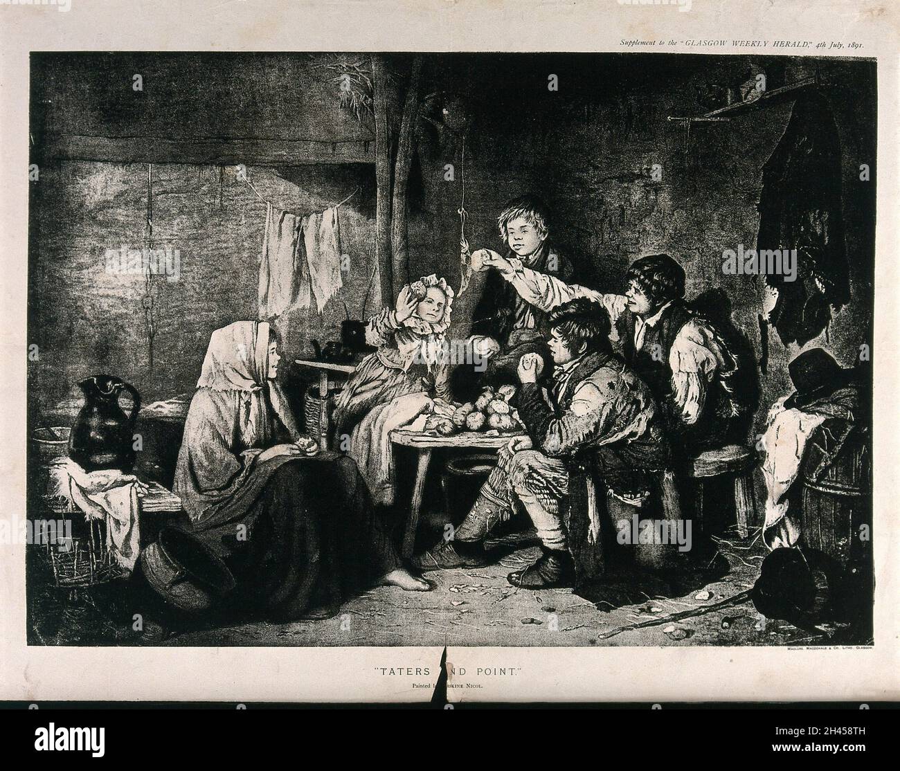 Children play a game with potatoes and a rag hanging from the beam ...