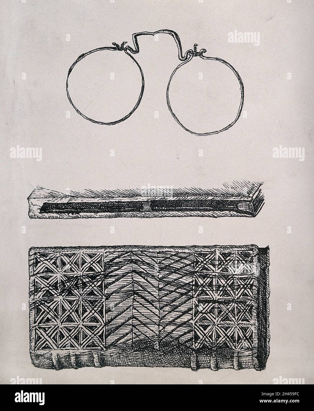 A pair of antique spectacles with their case. Transfer lithograph by C ...