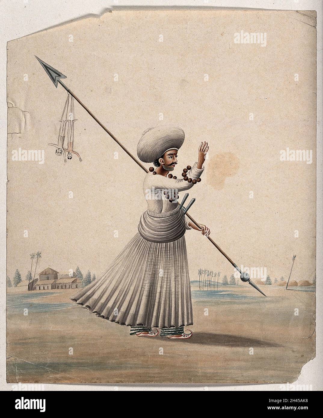 A man holding a long arrow with two puppets (?) hanging from it ...