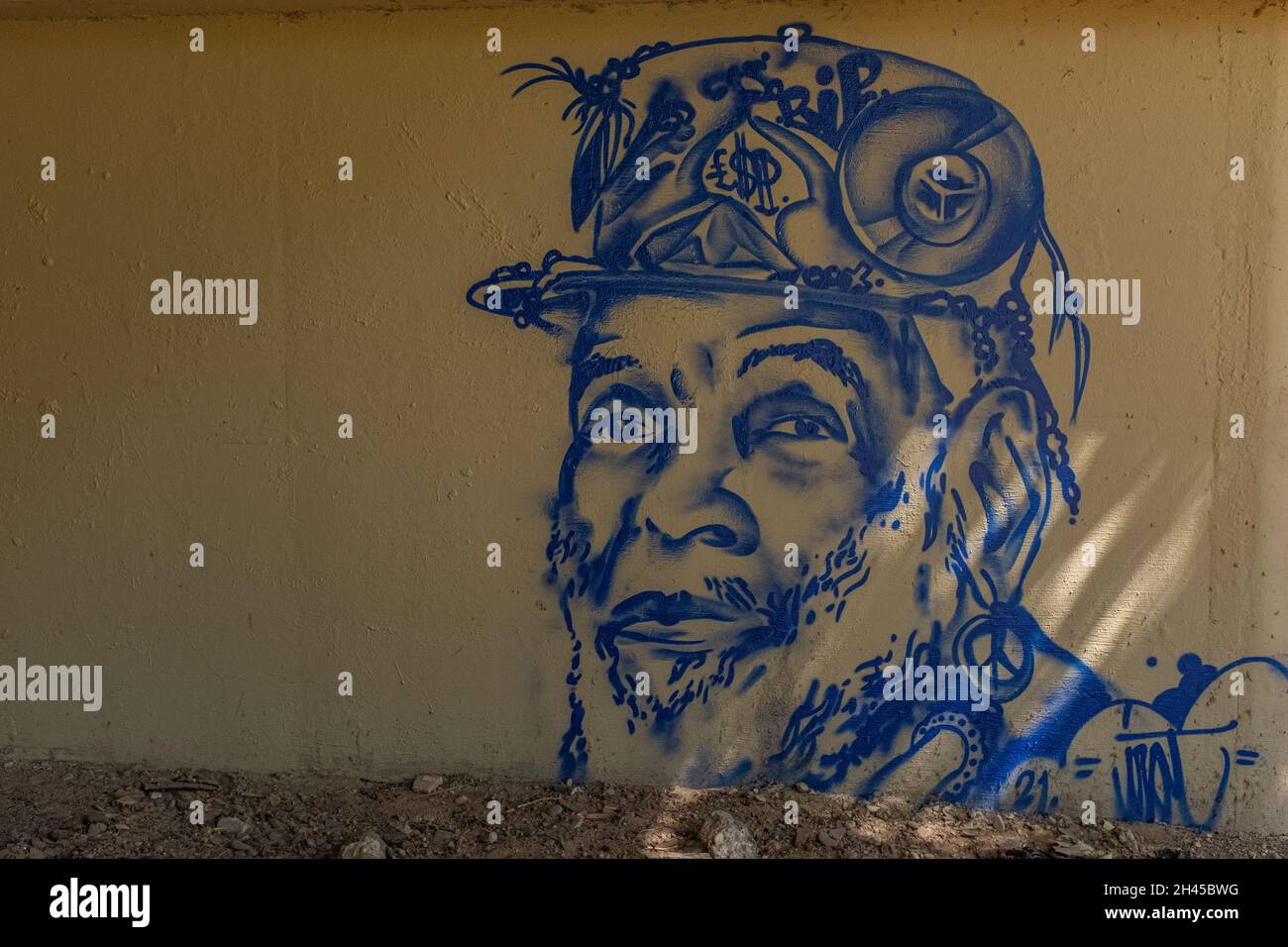 stencil graffiti homage to Lee "Scratch" Perry signed IROT under Bridge ...