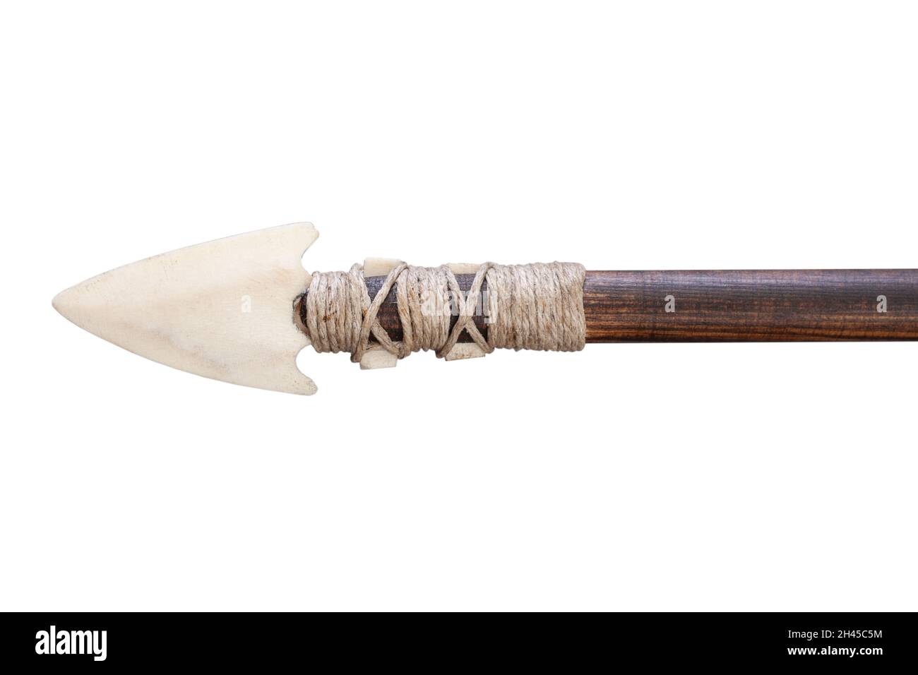 Arrowhead made of bone on arrow isolated on white background Stock ...