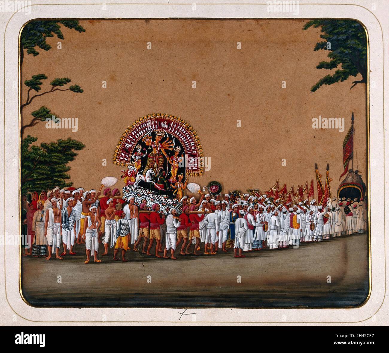 Durga Puja: a procession carrying an idol of Durga to honour her ...