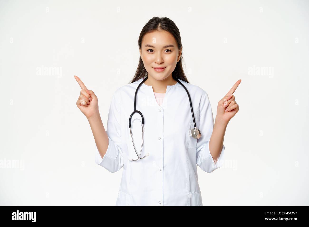 Portrait of asian female doctor, young healthcare worker in medical ...