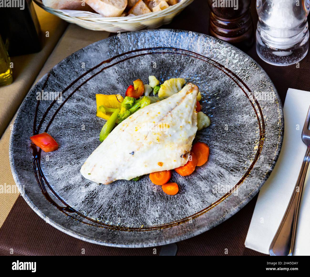 Fillet dorado fish with vegetables served at plate with balsamic Stock ...