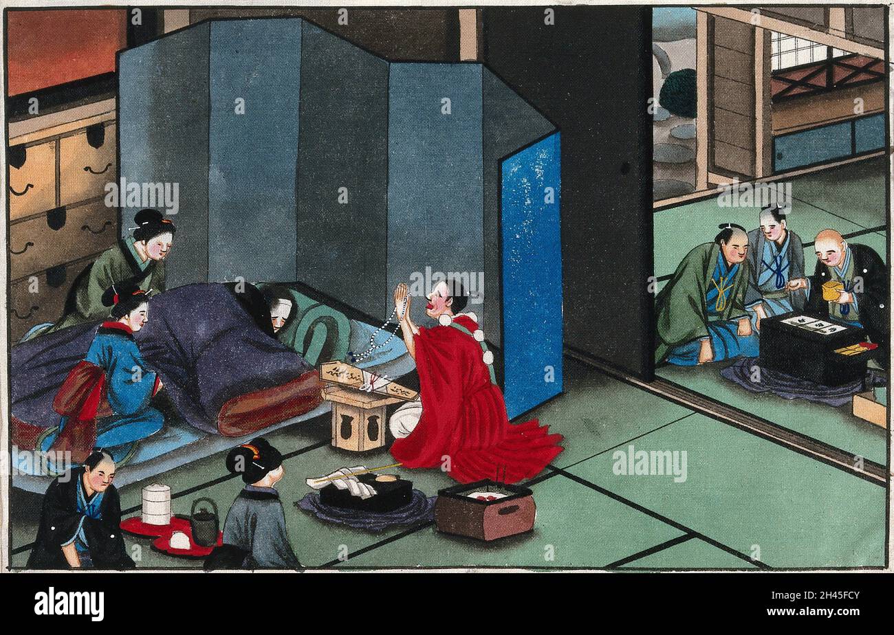 Japanese funeral customs: a grieving family at the bedside of a dead ...