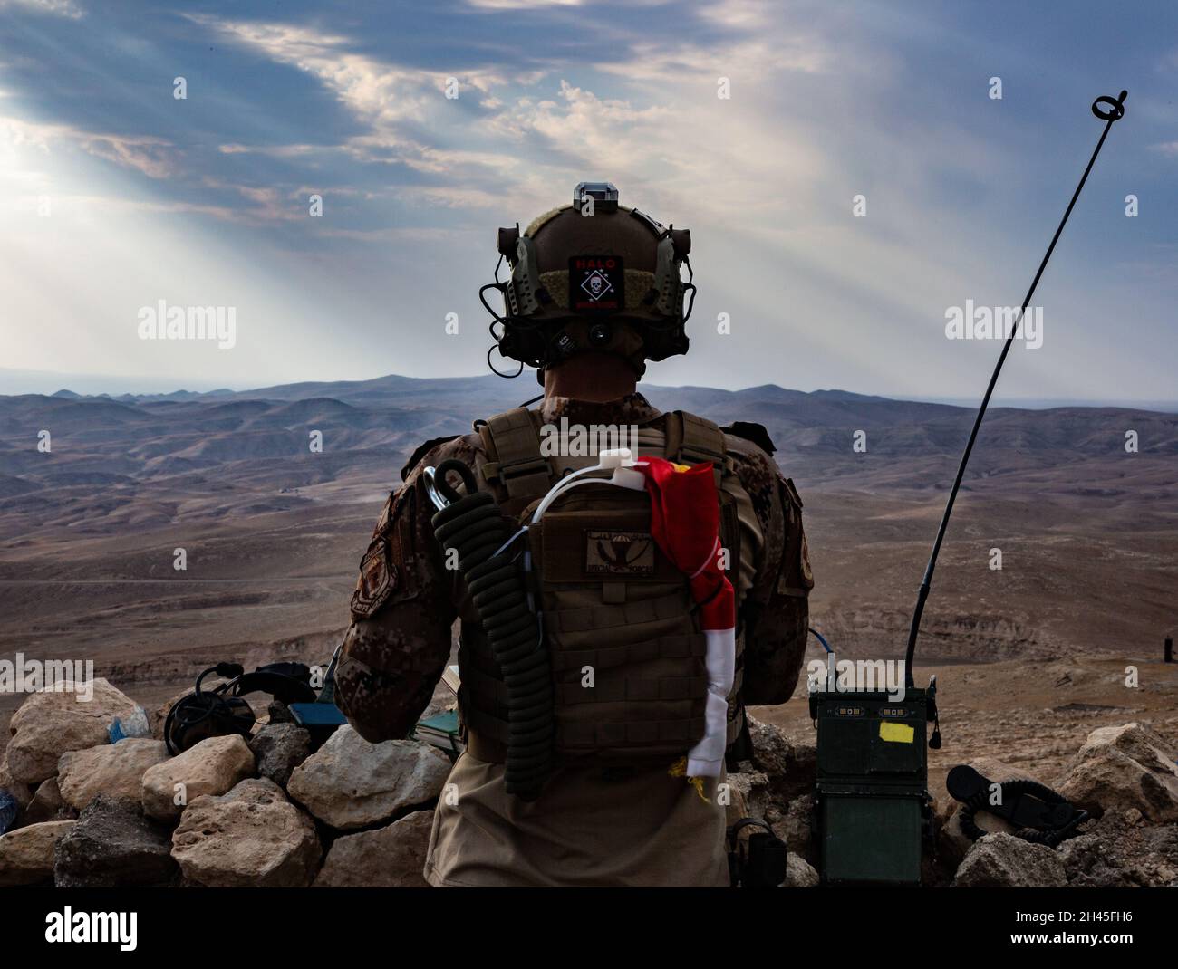 An Iraqi Terminal Attack Controller (ITAC) identifies a target during ...