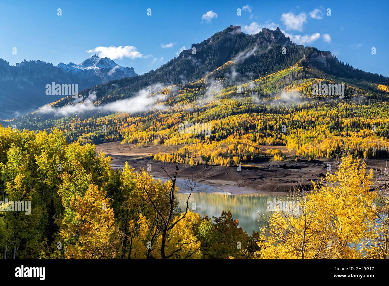 Low clouds hang about the Cimarron Ridge and mountains with a carpet of ...