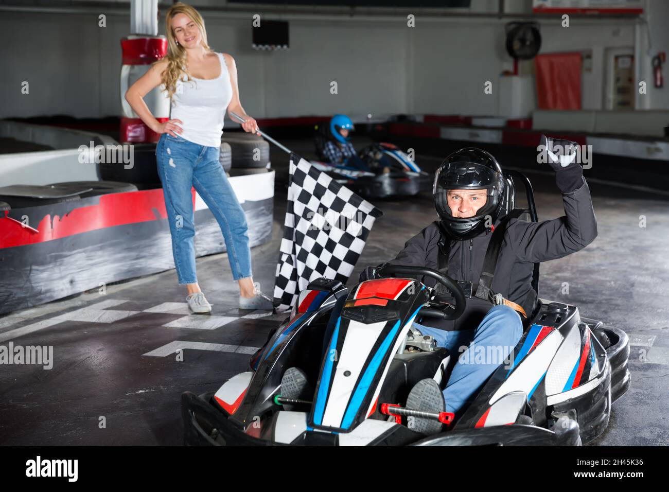 Racer driver man flag hi-res stock photography and images - Alamy