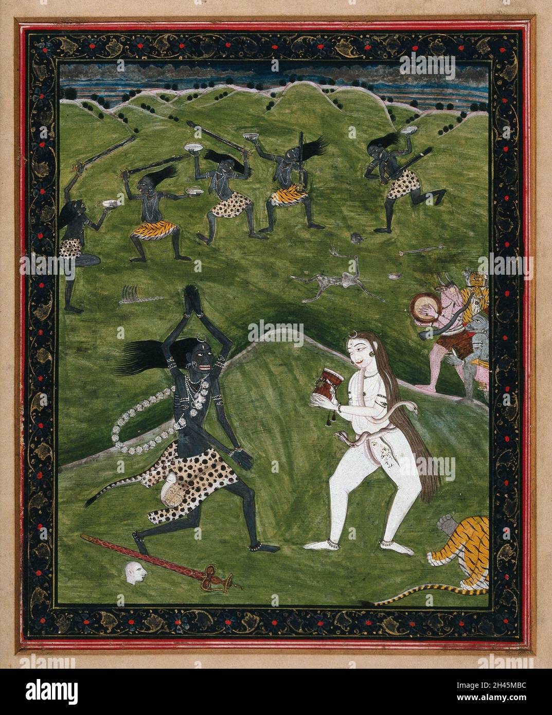 Lord Shiva, in one of his ferocious aspects, dancing with Parvati ...