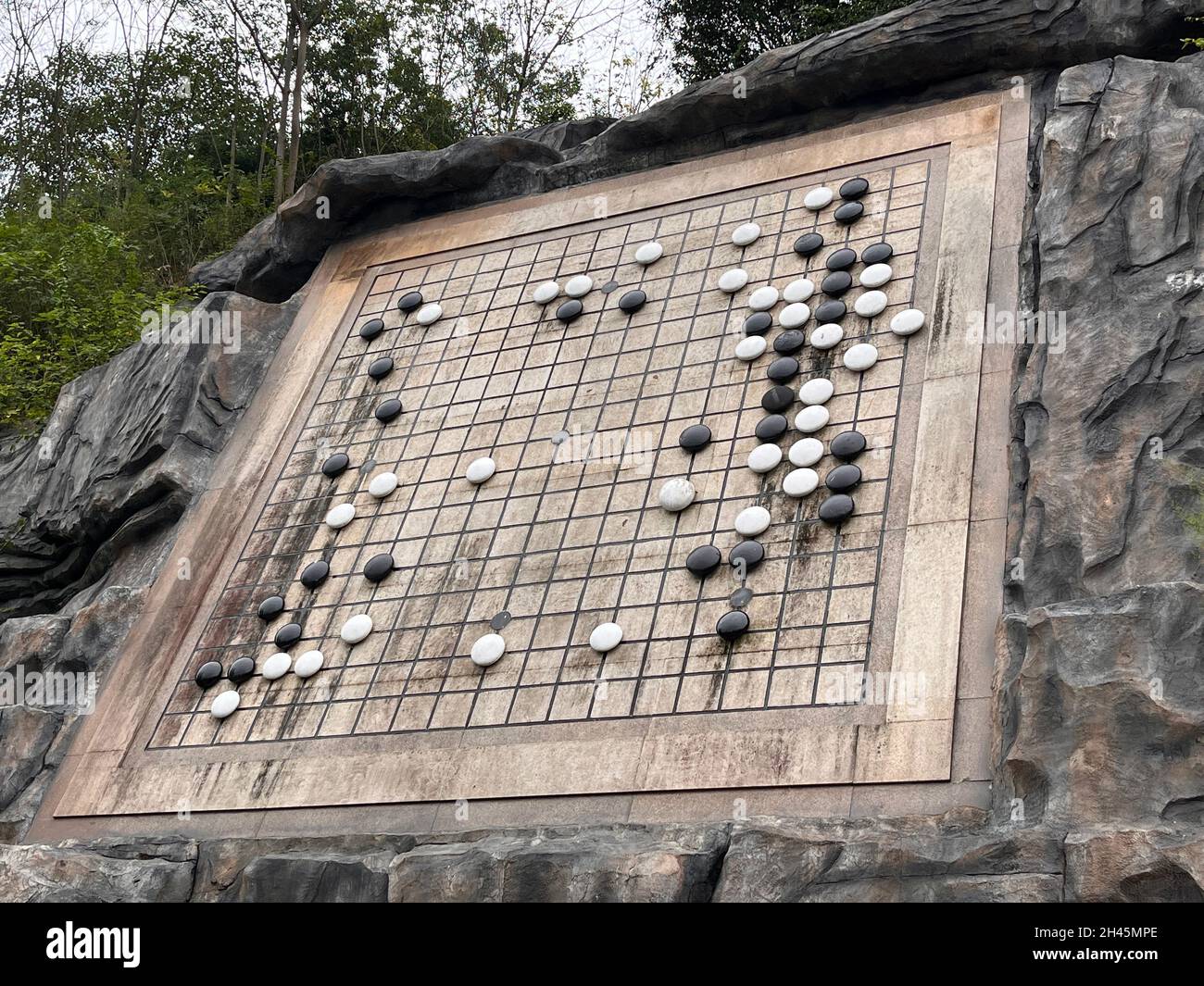 CHONGQING, CHINA - OCTOBER 31, 2021 - A giant Go board hangs on a ...