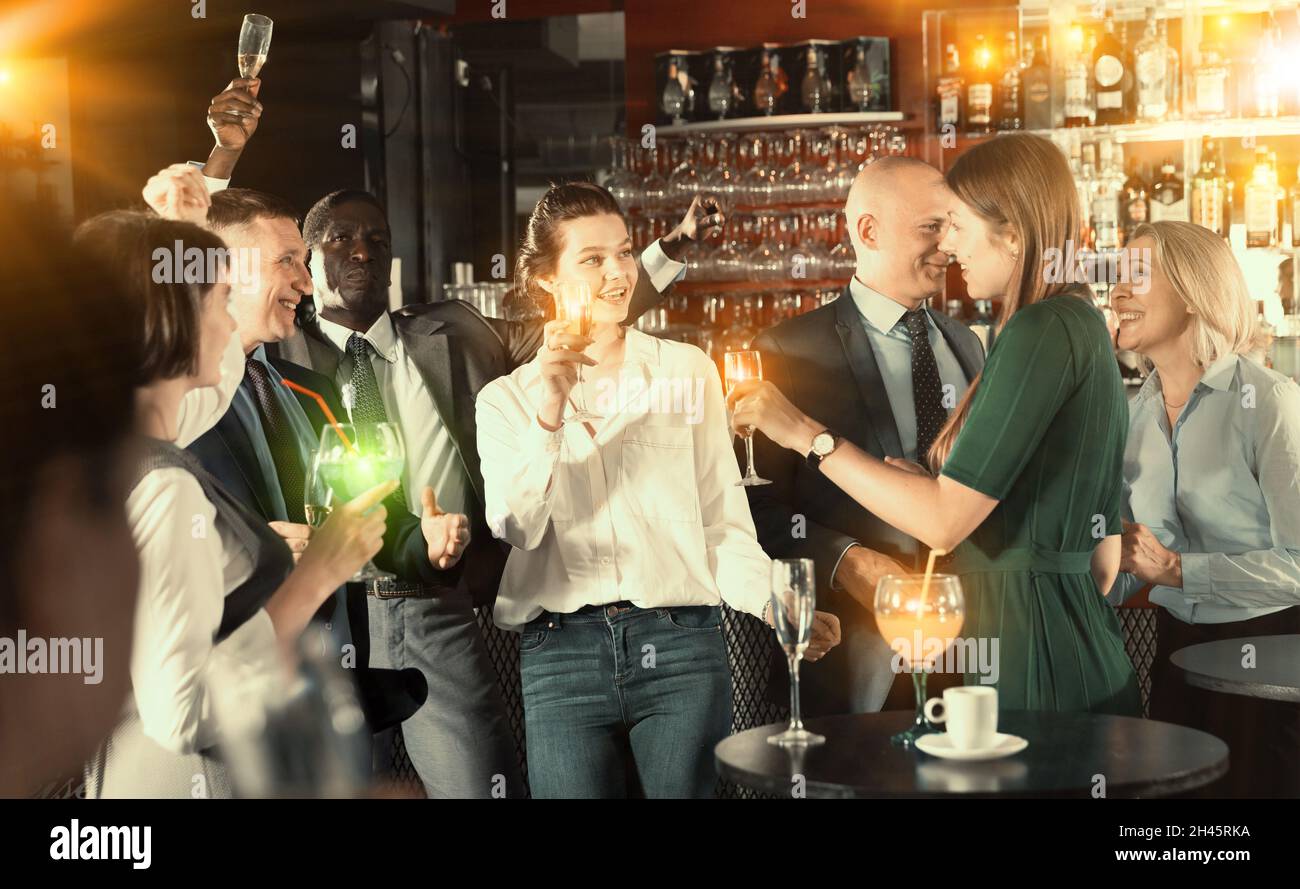 Young women having fun on office party Stock Photo - Alamy