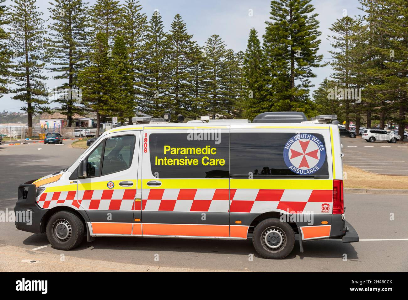 Australian ambulance operated by NSW Health in Sydney is parked next to ...
