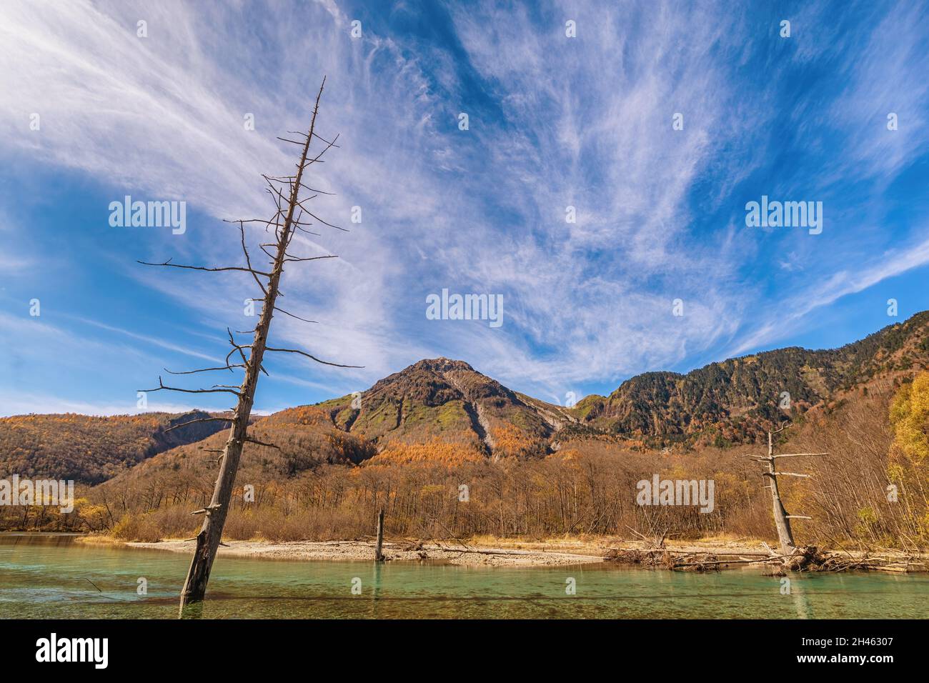 Nature landscape at Kamikochi Japan, autumn fall foliage with pond and ...