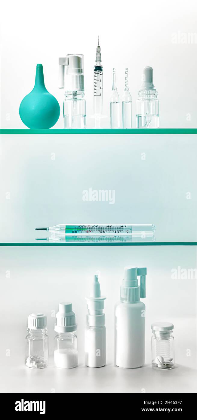 Pharmacy medicines on the shelves. Bottles and medical care items Stock ...