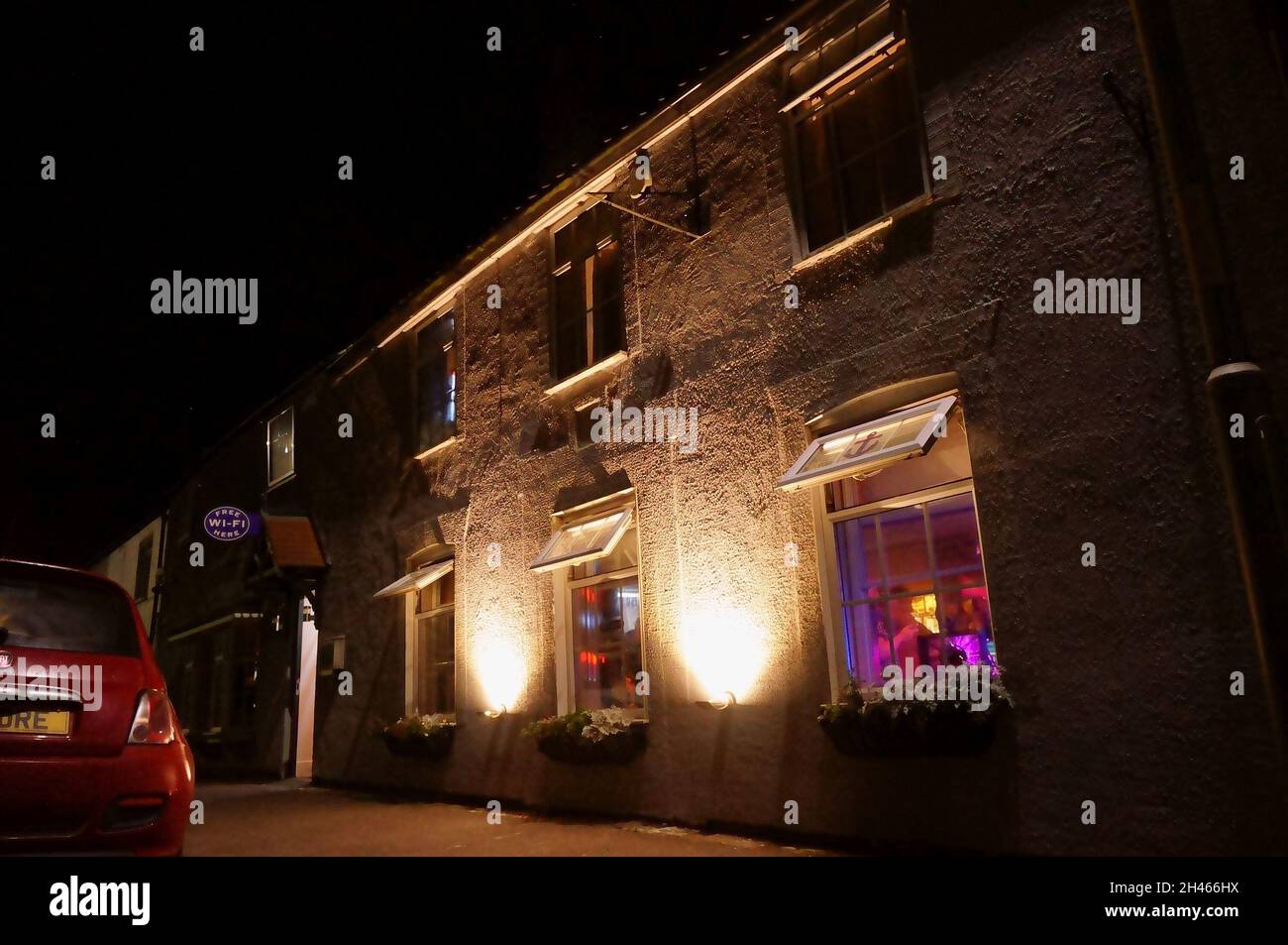 Night time view of exterior facade building hi-res stock photography ...