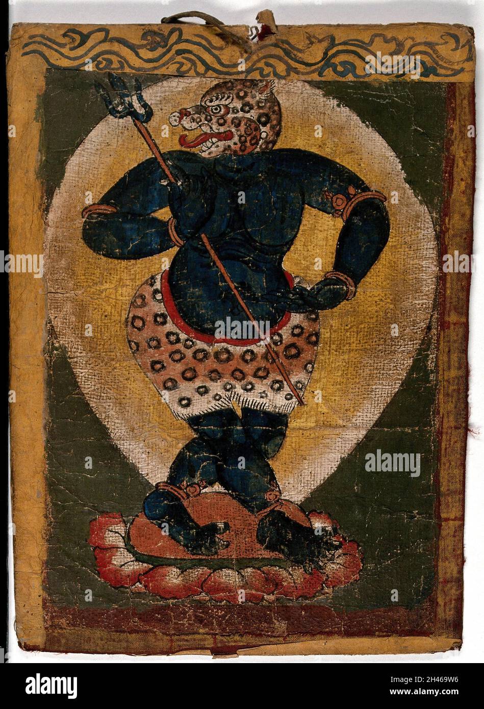A blue Tibetan demon with a leopard's head (?), holding a trident ...