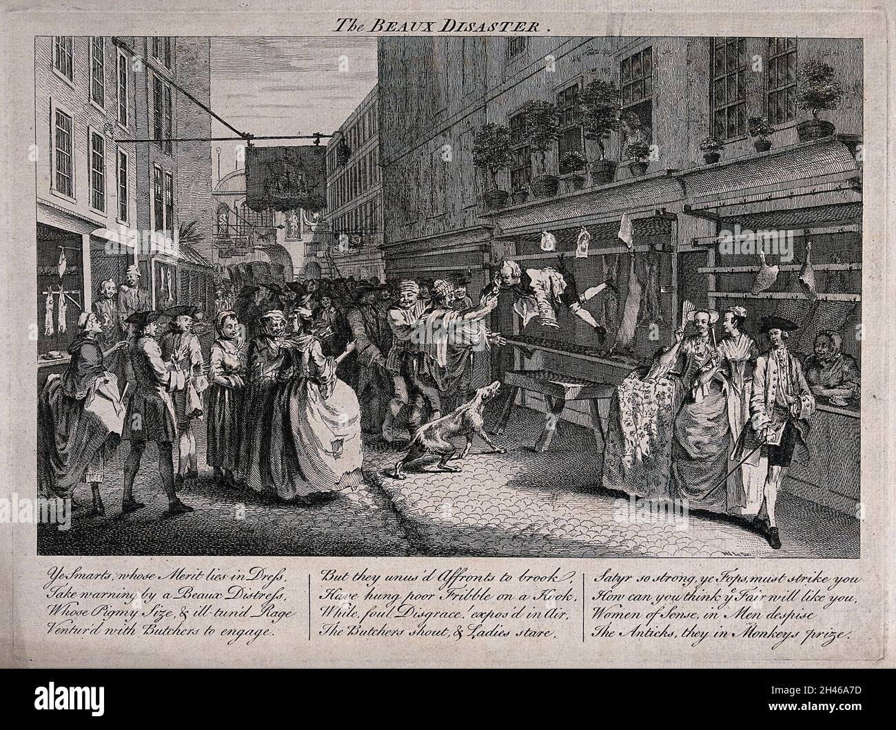 A man has been strung up on a pole along with carcasses, a crowd has ...