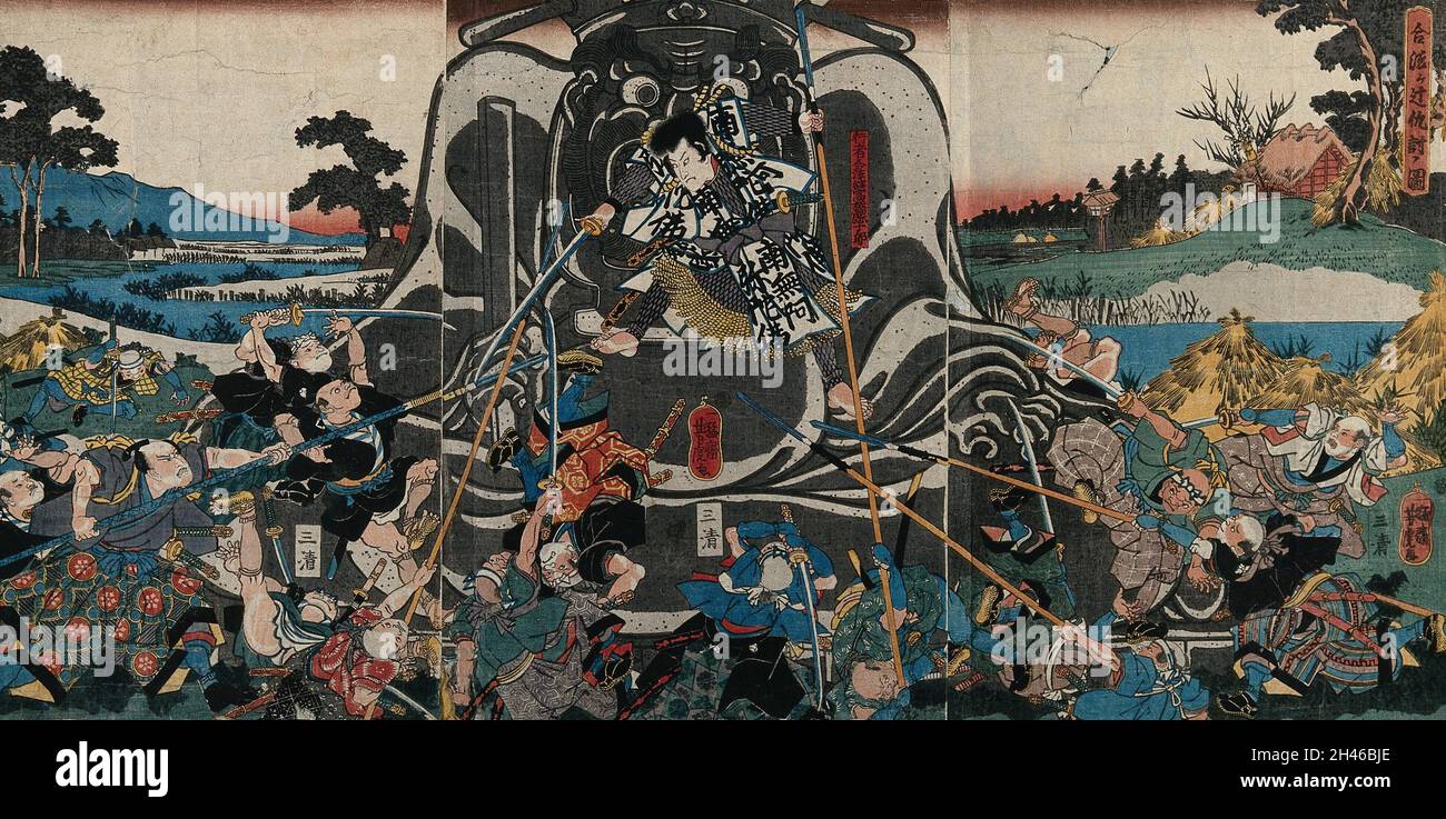 A samurai standing on the lap of a great, outdoor stone statue of the ...