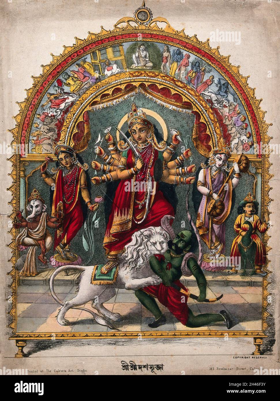 Durga slaying the Buffalo Demon with other deities, set in a torana ...