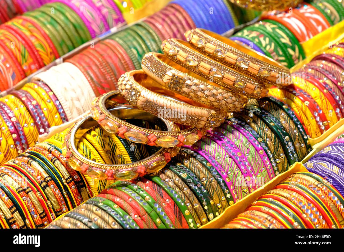 Indian colorful bangles displayed in local shop in a market of Pune ...