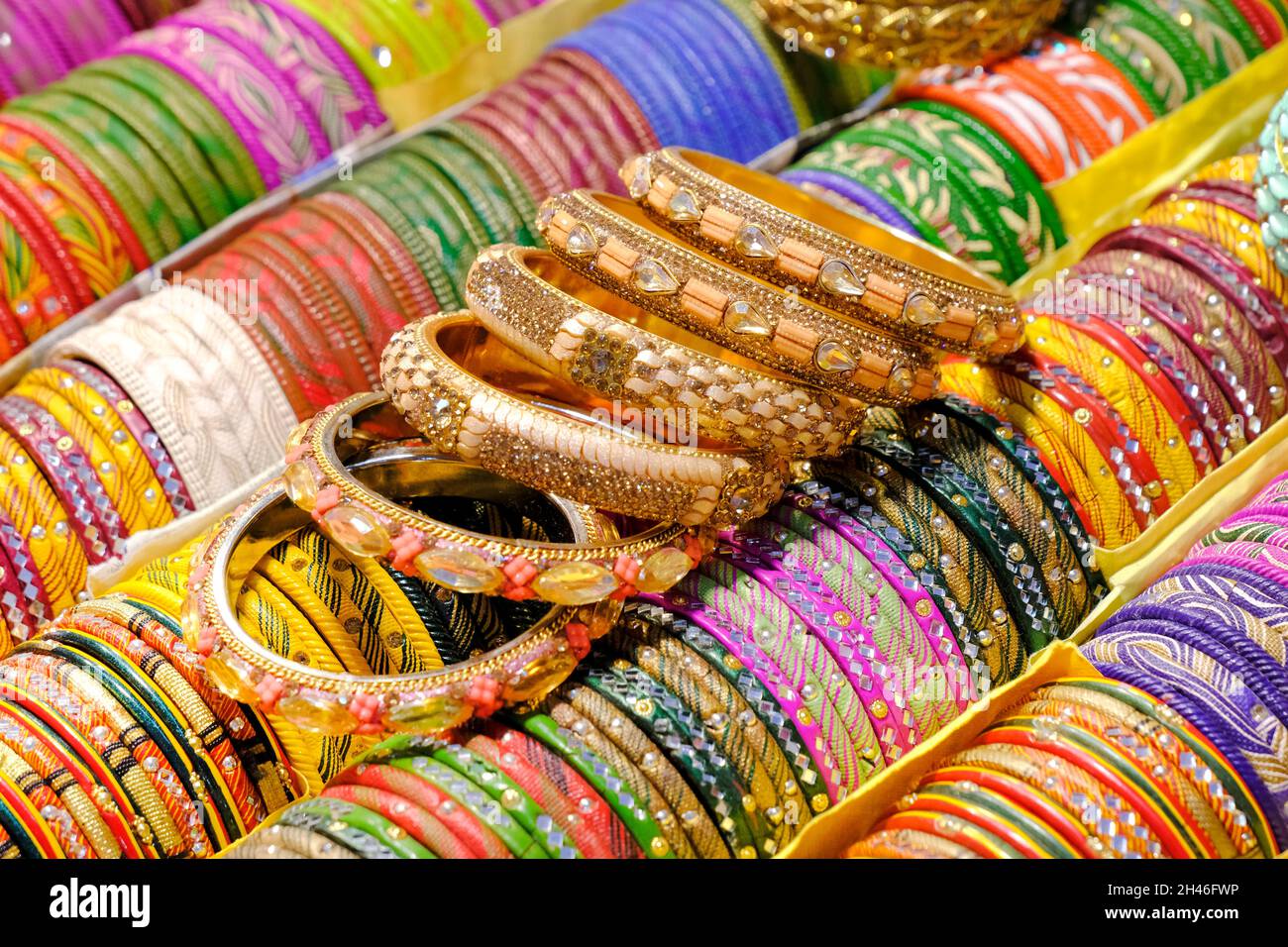Indian colorful bangles displayed in local shop in a market of Pune ...