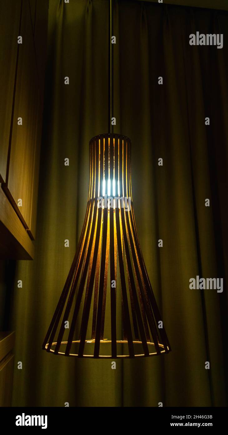 Artistic lamp hood made from wood in the corner of bedroom Stock Photo ...
