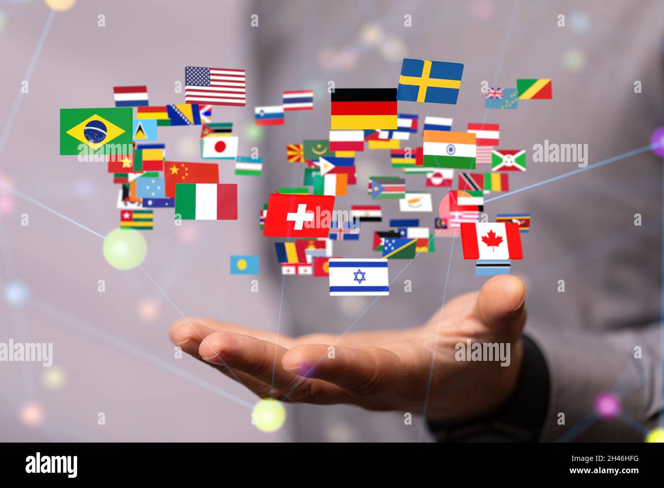 Person presenting the virtual projection of international country flags ...