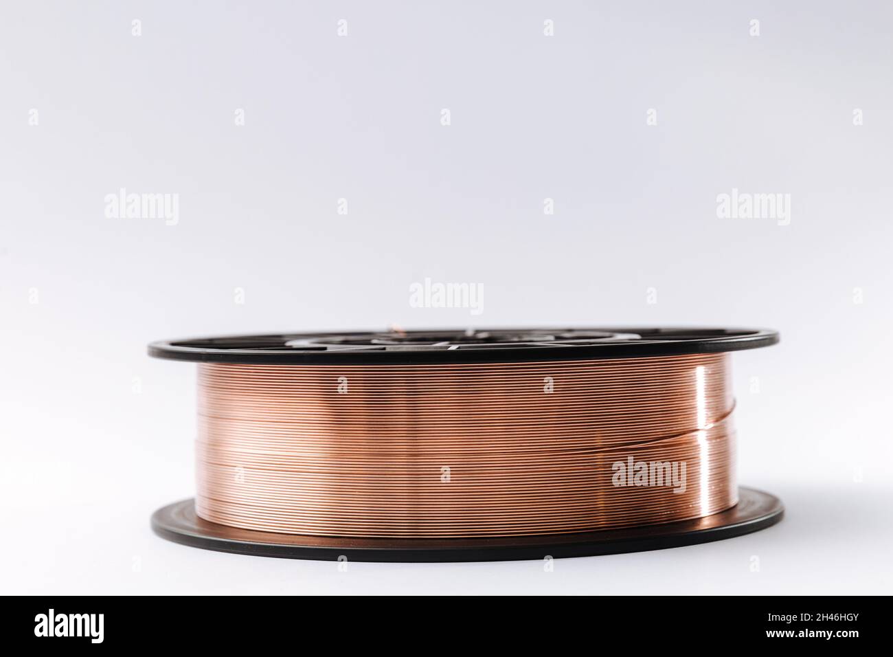 Welding wire spool on a white background, copy space Stock Photo - Alamy