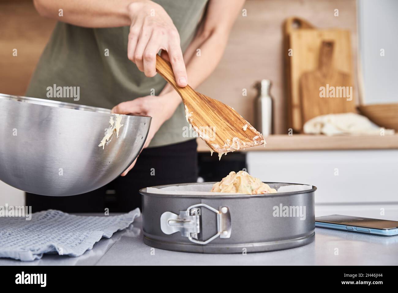 Girl pouring cake mix cake hi-res stock photography and images - Alamy