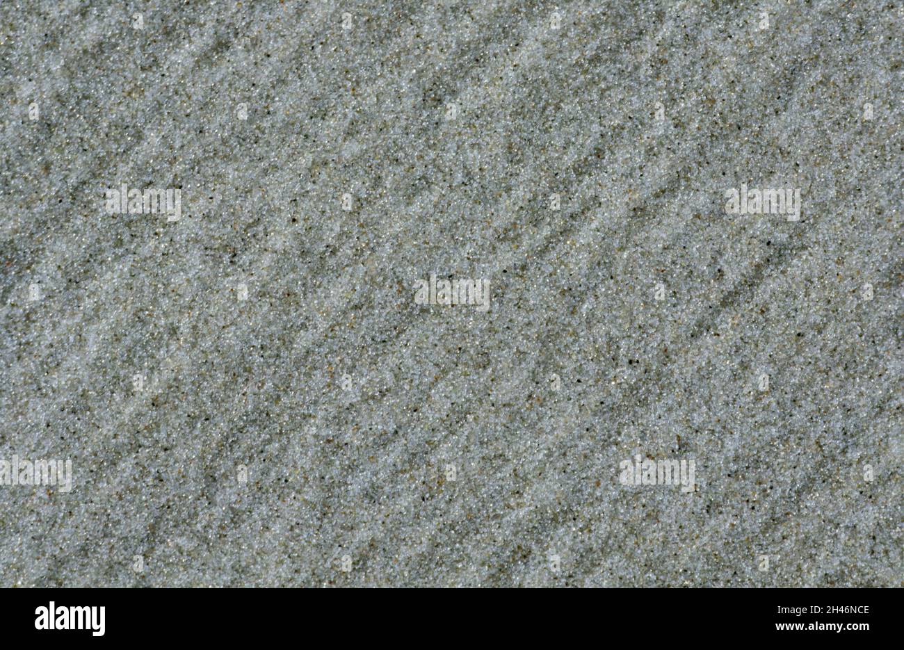 Close up on sand 1986, analog. Pattern, texture i the sand, small ...