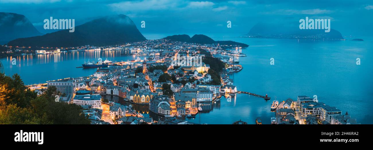 Alesund, Norway. Night View Of Alesund Skyline Cityscape. Historical ...