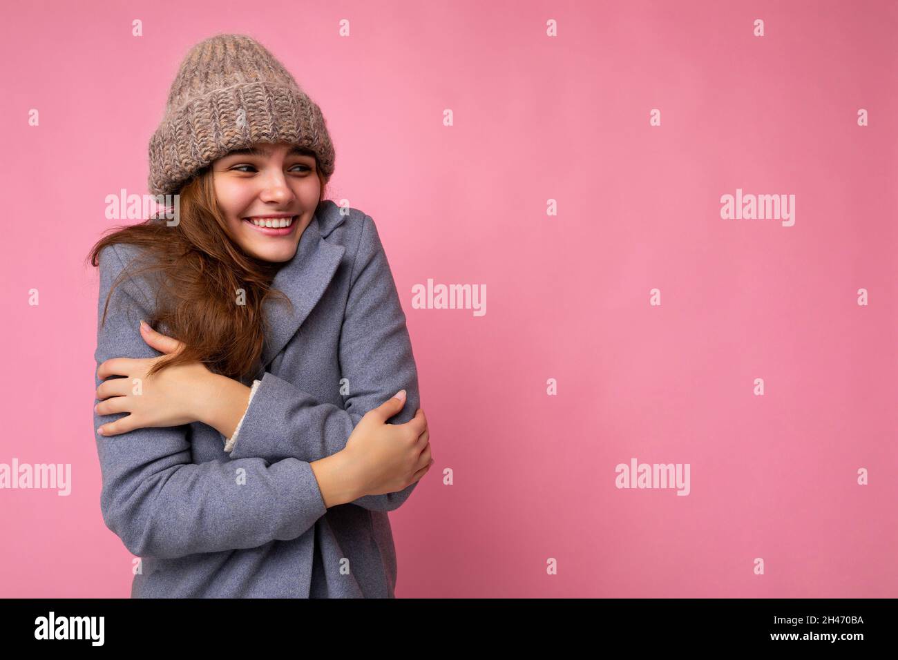 Beautiful positive happy young brunette woman isolated over colourful ...