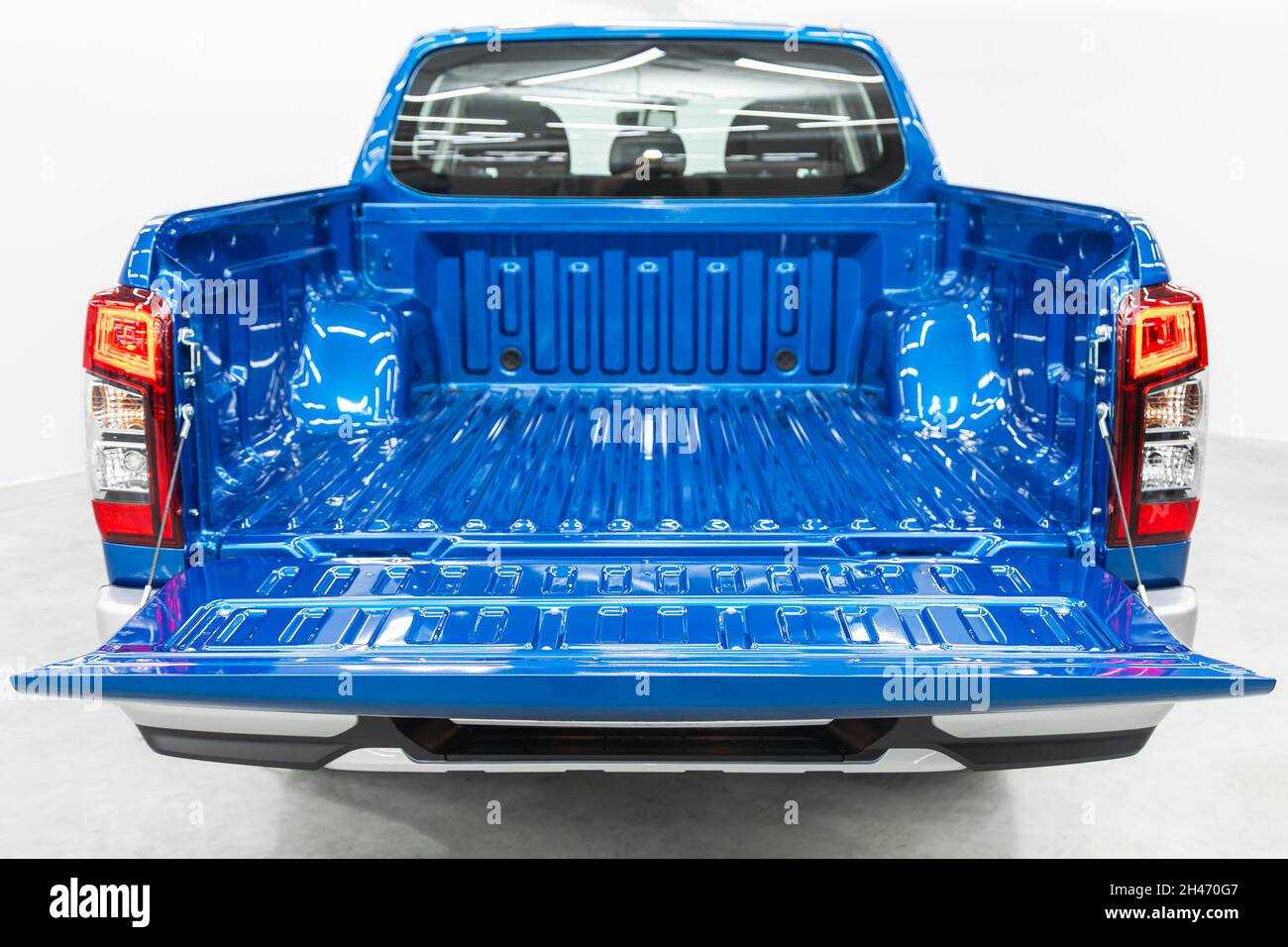 Rear view of a car pickup with an open trunk. Exterior of a modern car ...
