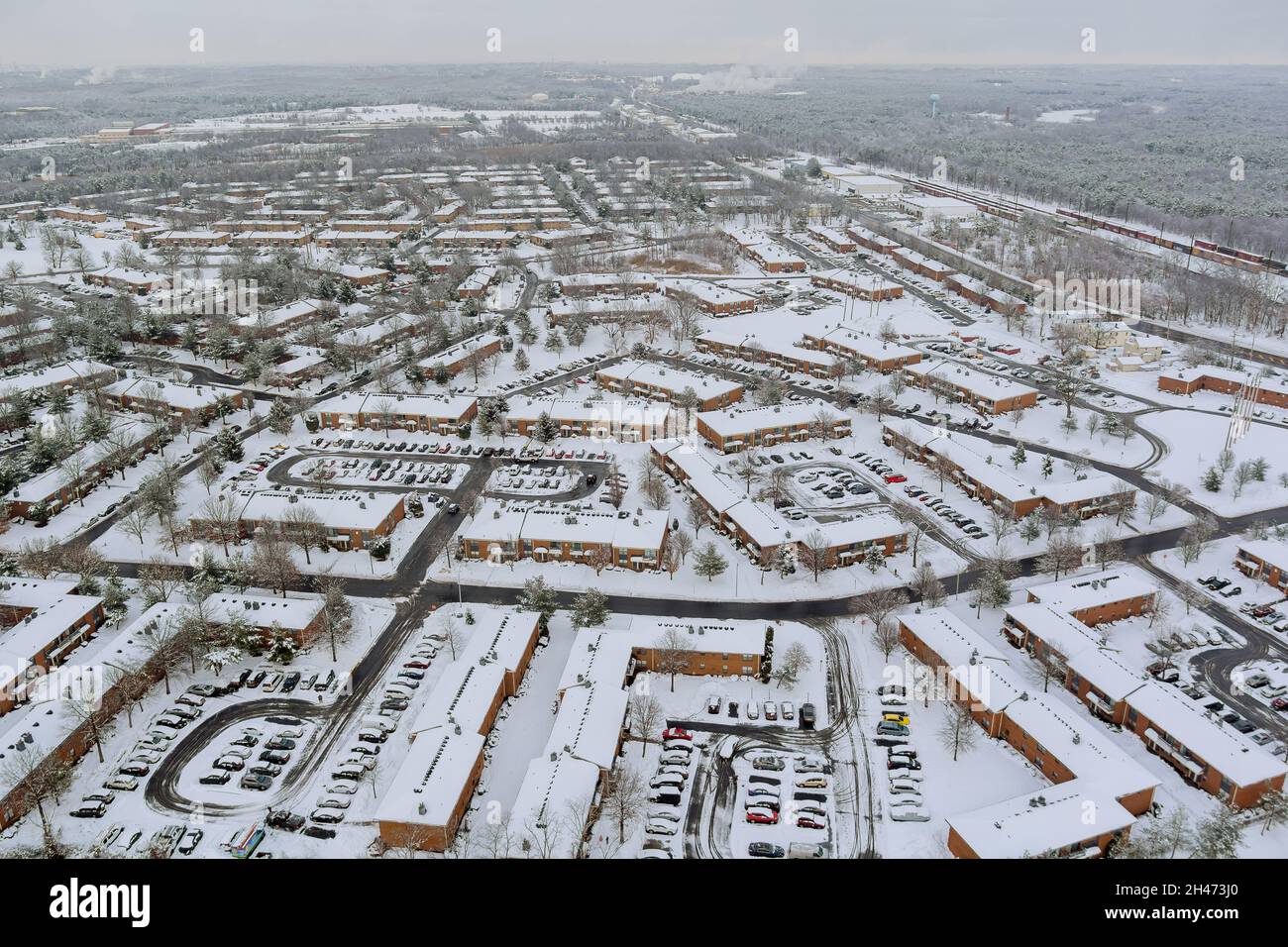 Aerial view winter landscape American town small apartment complex of a ...